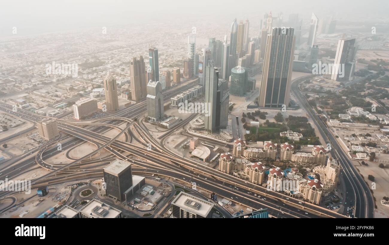 Dubai skyline along Sheikh Zayed Road at sunset. Aerial view of ...