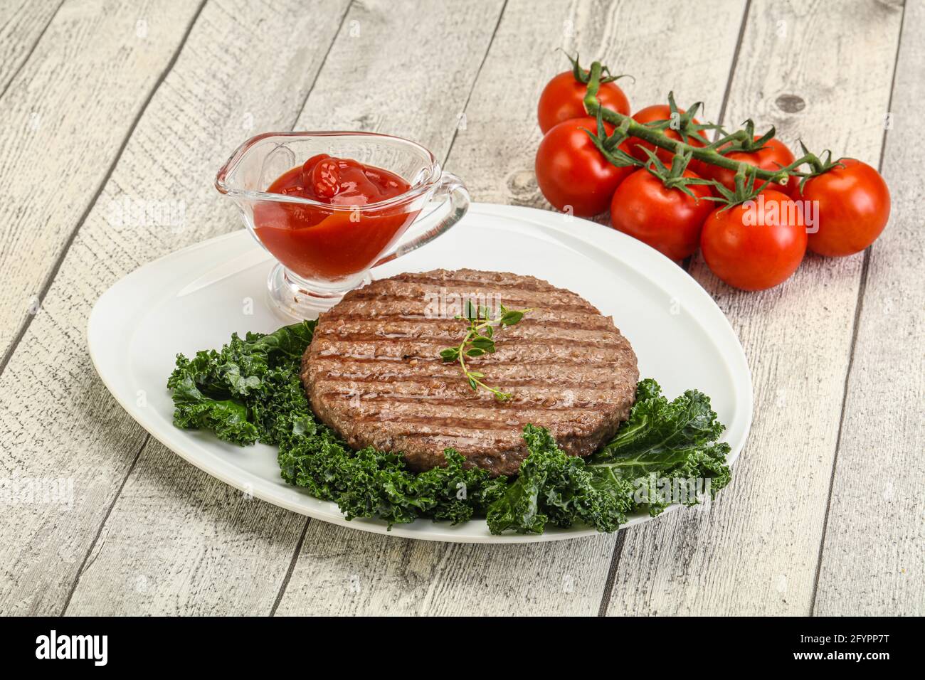 Grilled tasty beef cutlet for burger Stock Photo - Alamy