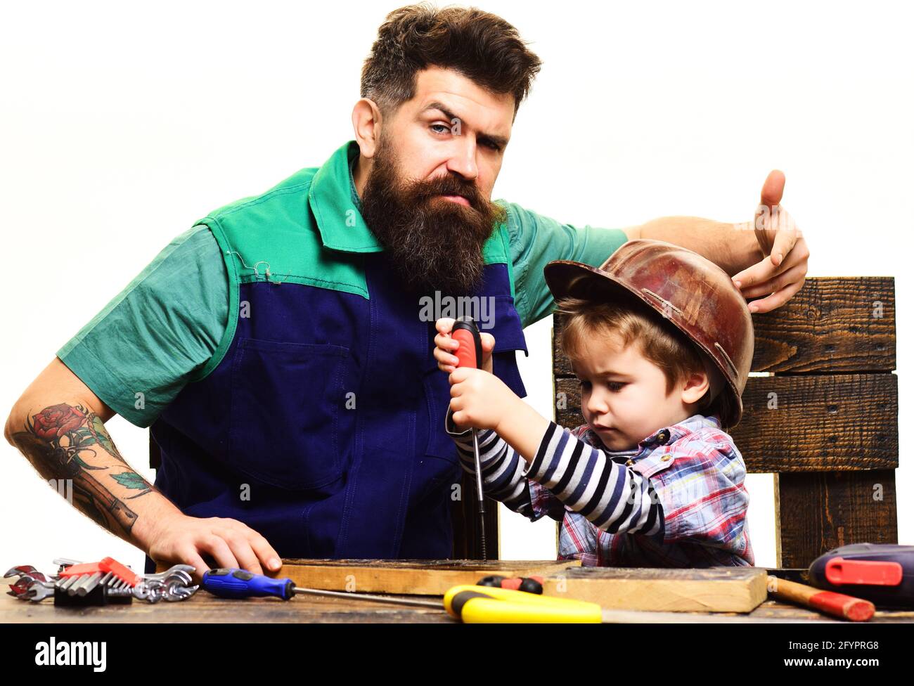 Repair and assistance concept. Father and son repairing together ...