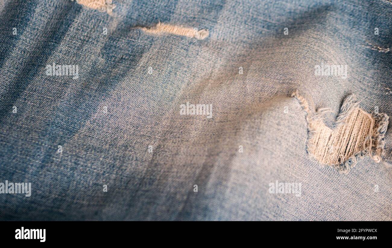 White denim ripped jeans hi-res stock photography and images - Alamy