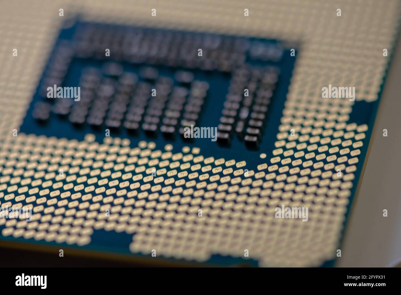 Close-up of a CPU golden pads. Shallow depth of field Stock Photo - Alamy