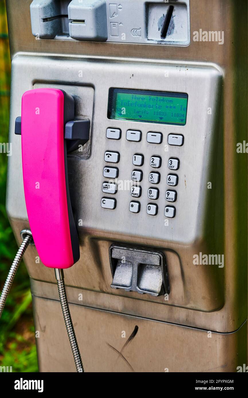 Berlin, Germany - May 27, 2021: View to a public phone from the ...