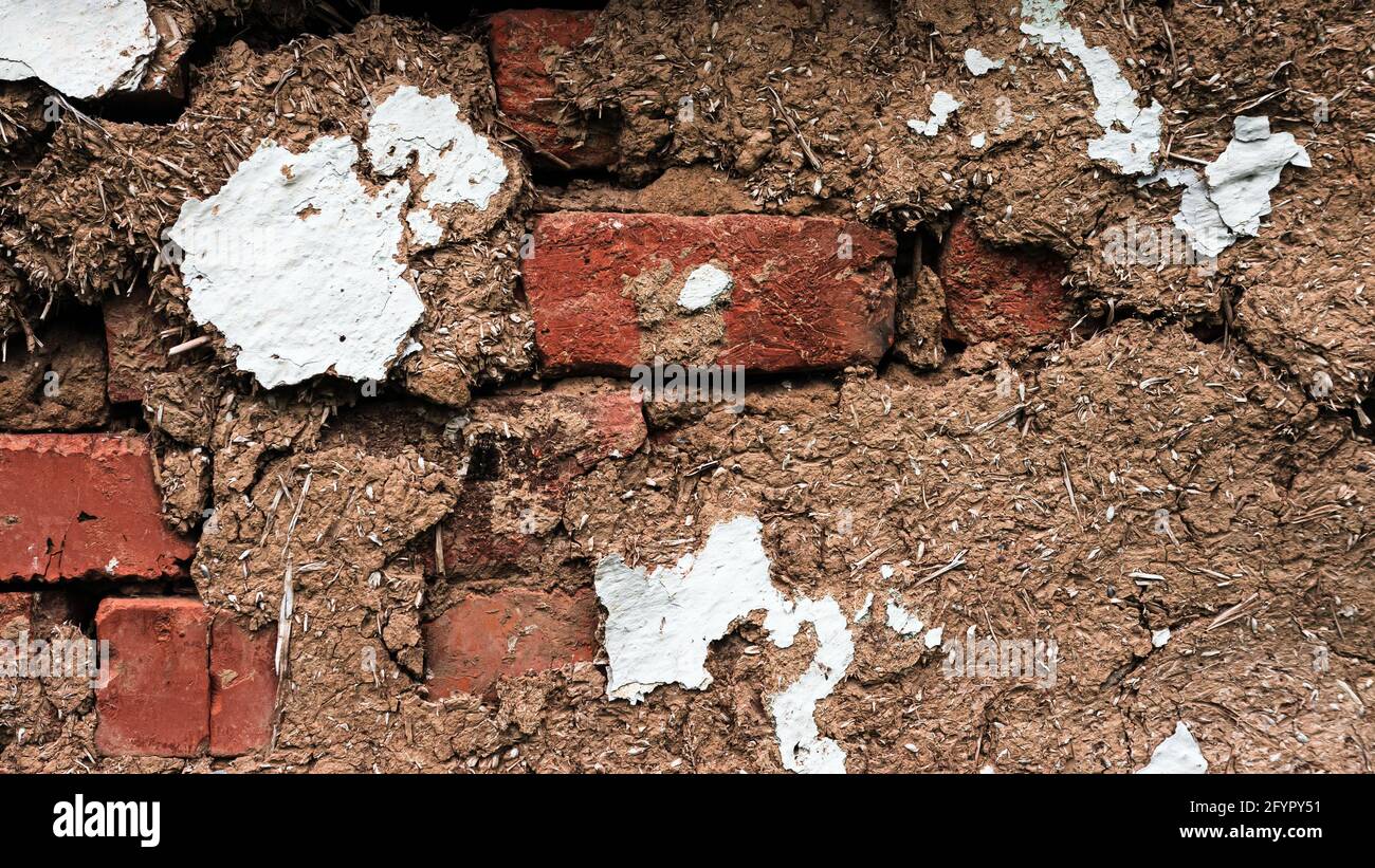 Ancient wall of clay and straw and brick. Antique wall background ...