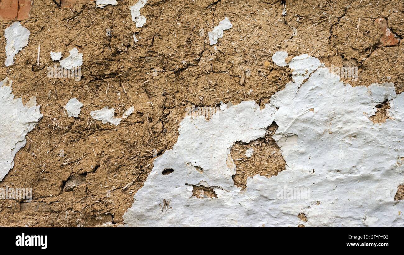 The texture of the hut is old. Ancient wall of clay and straw. Ancient ...