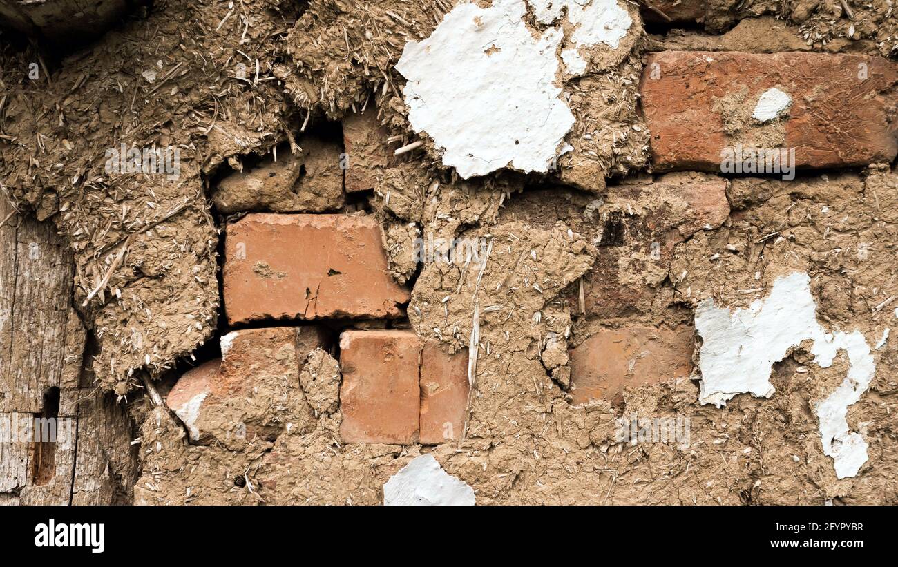 Wooden wall made of clay and straw. Antique texture. Red brick ...