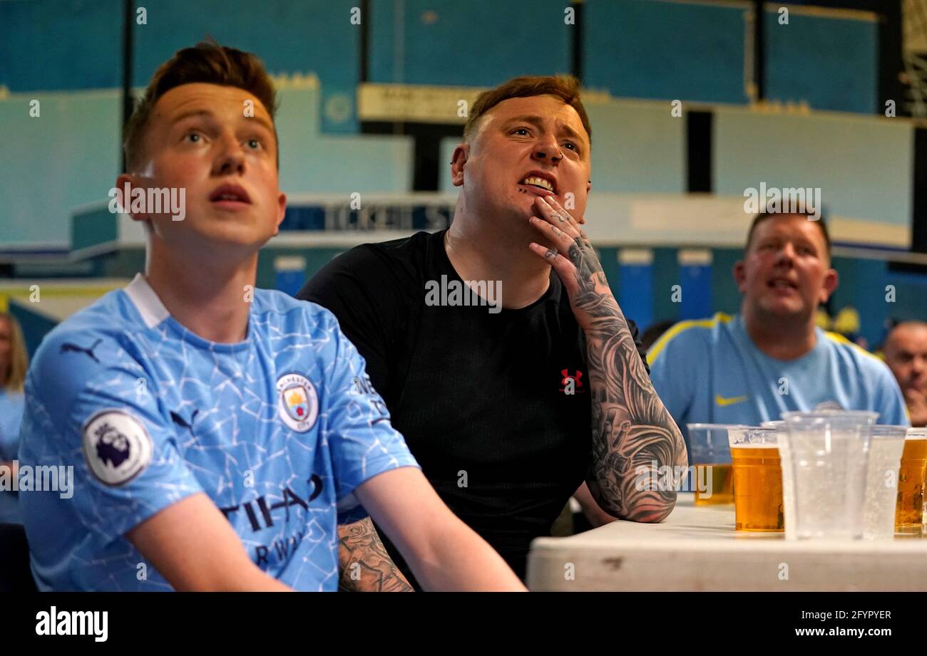 Manchester City fans react at the Mary Ds Pub during the UEFA Champions ...