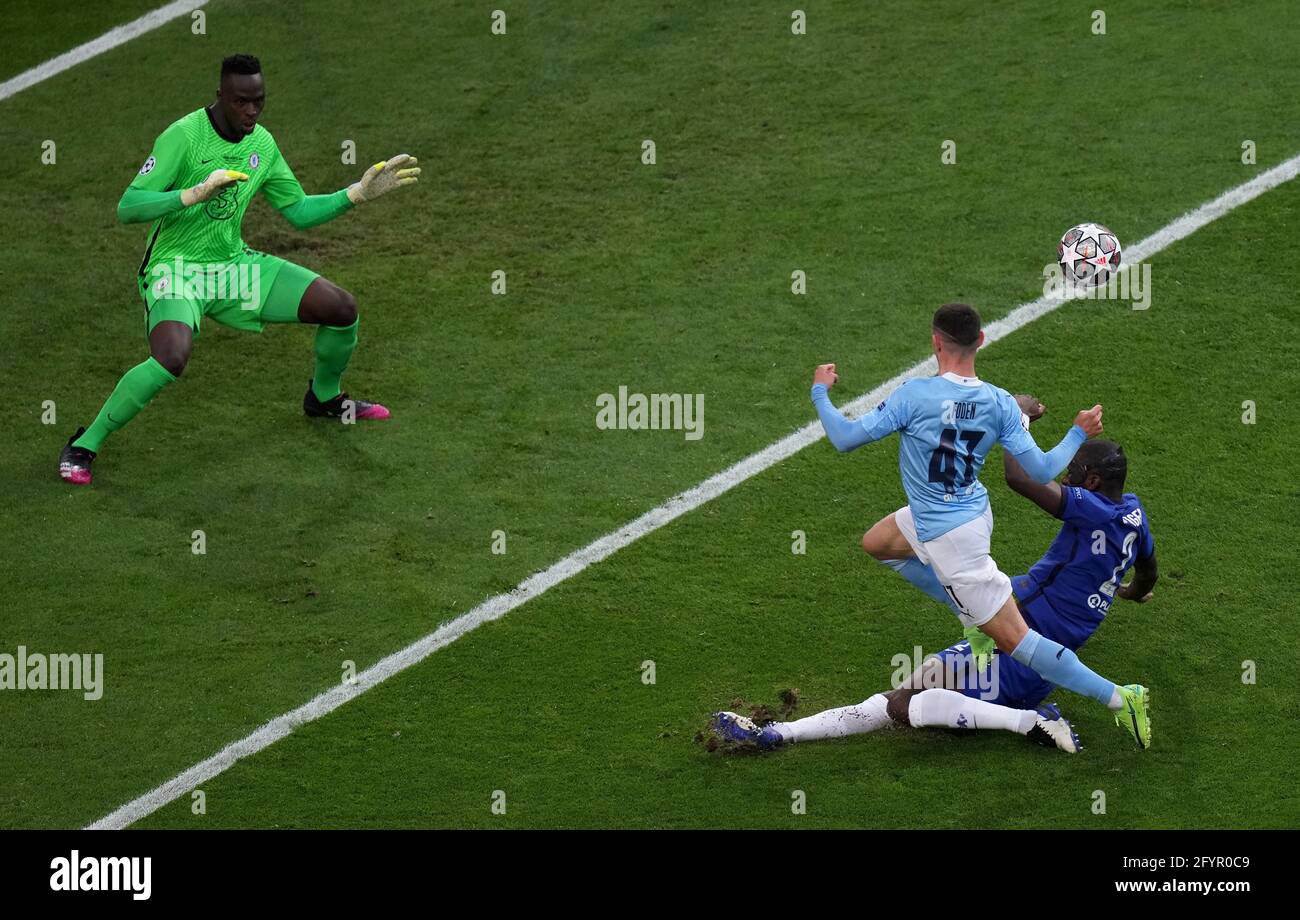 Chelsea's Antonio Rudiger (right) blocks a shot from Manchester City's ...