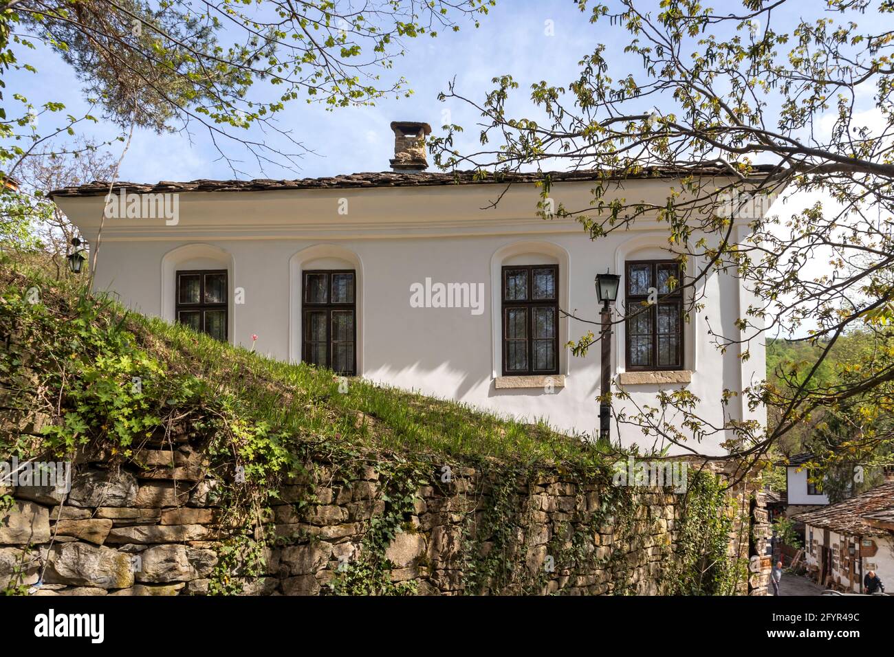 Typical street and old houses at historical village of Bozhentsi ...