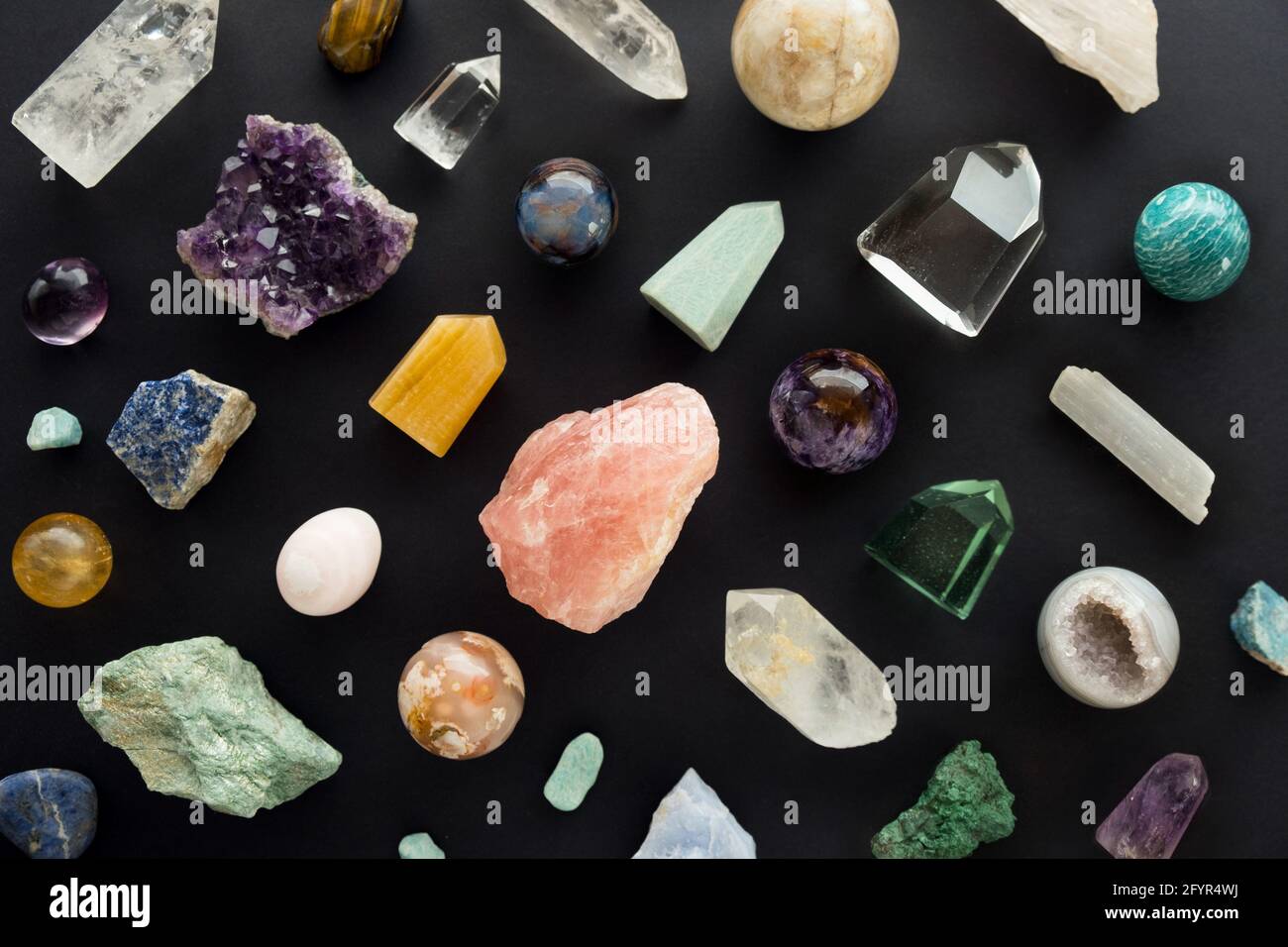 Crystal stones set on black background. Gemstones and crystals on dark ...