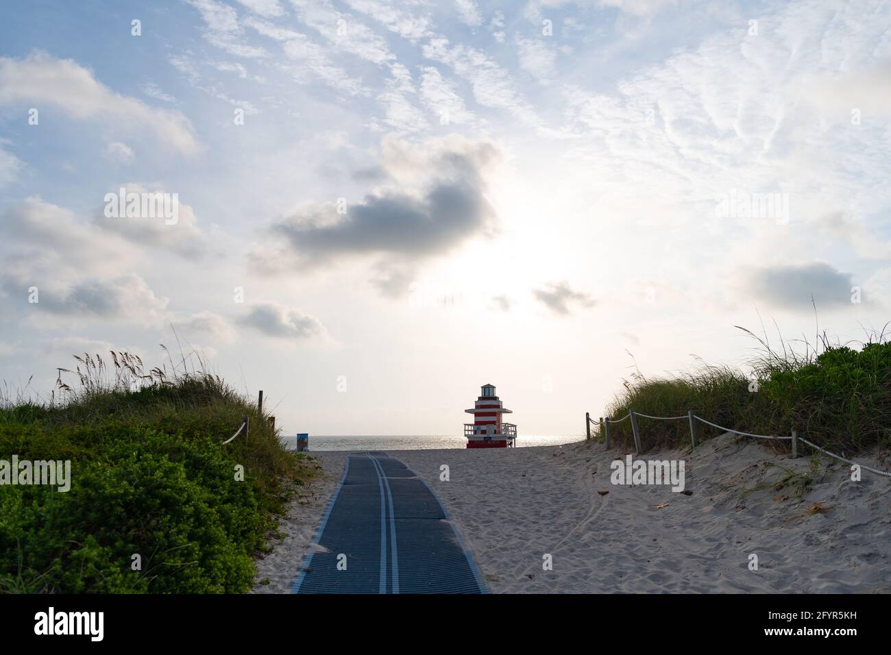 Smooth pathway across dunes to South Beach of Miami city in Florida ...