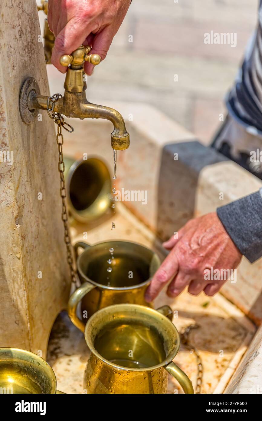 Ritual hand washing hi-res stock photography and images - Alamy