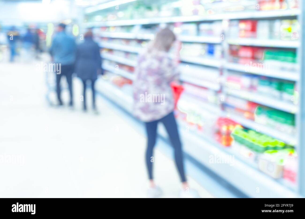 Young woman near shelves hi-res stock photography and images - Alamy