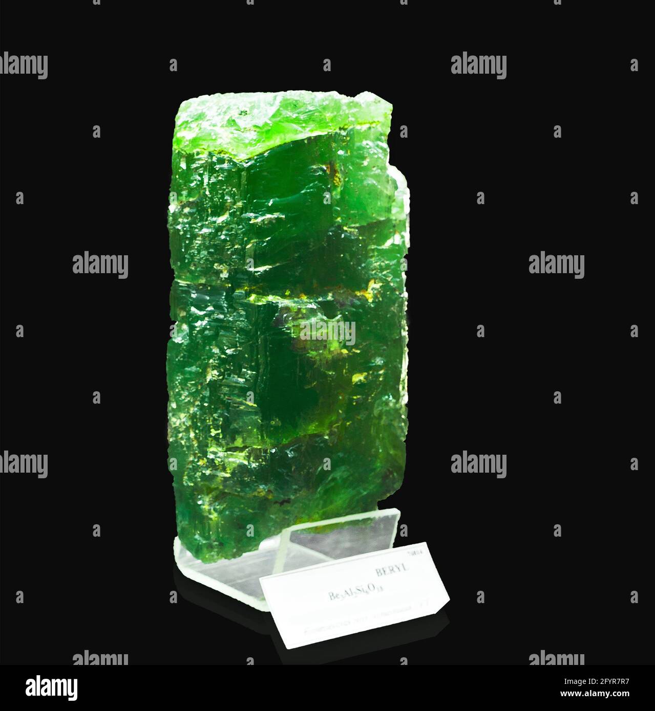 Beryl (Emerald) crystal exhibit in dark Stock Photo - Alamy