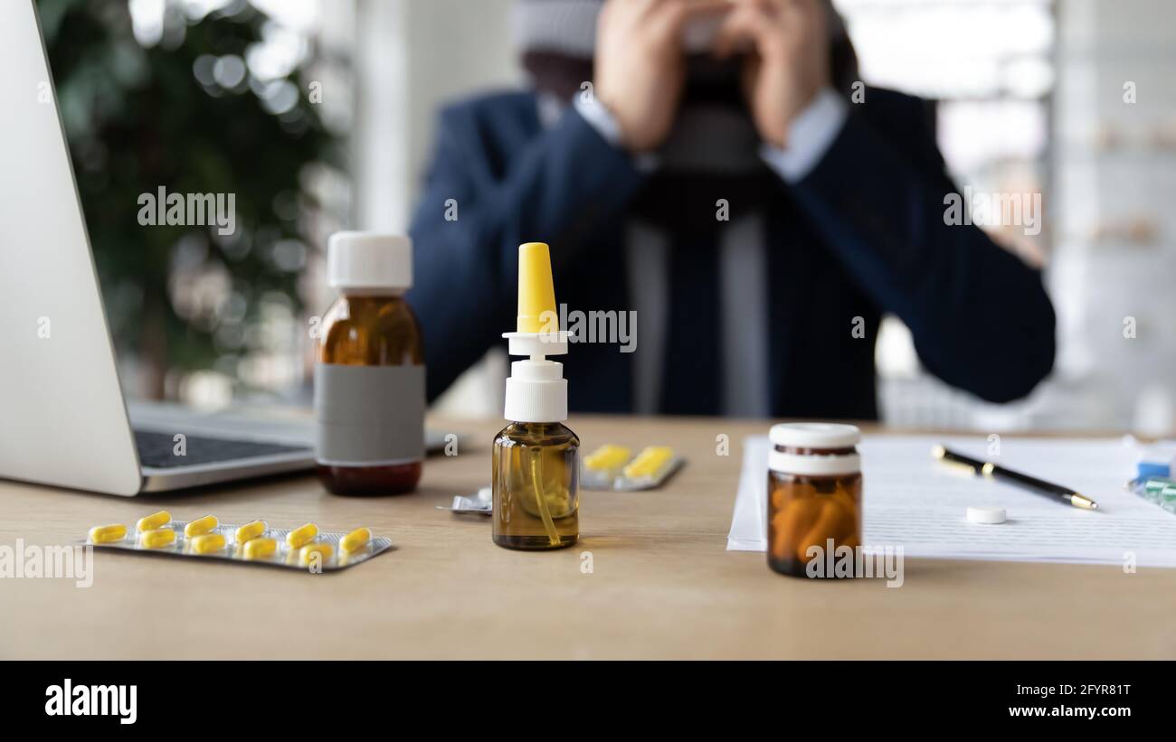 Sick employee at desk hi-res stock photography and images - Alamy