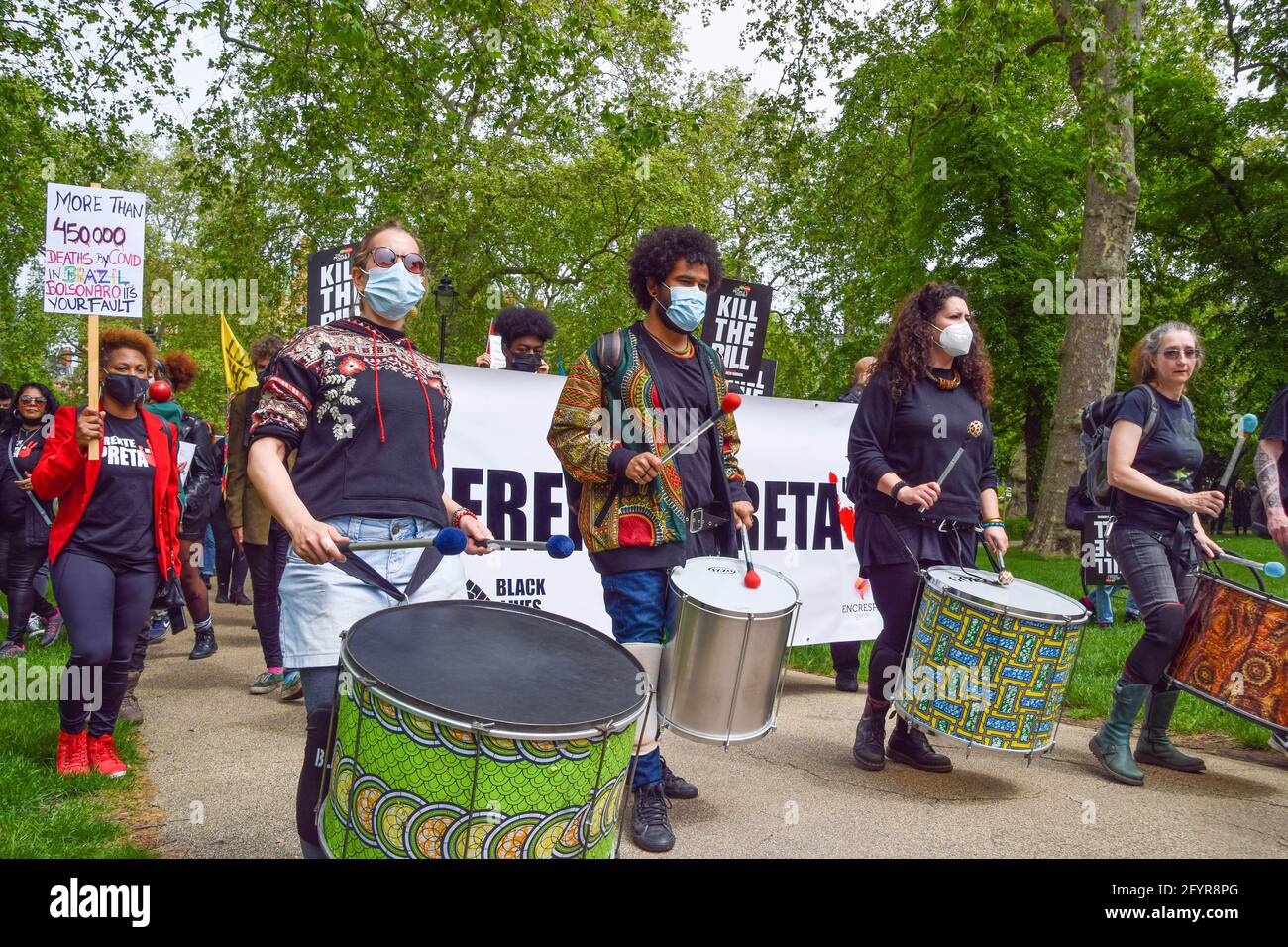 London, UK. 29th May, 2021. Demonstrators play the drums in Russell ...