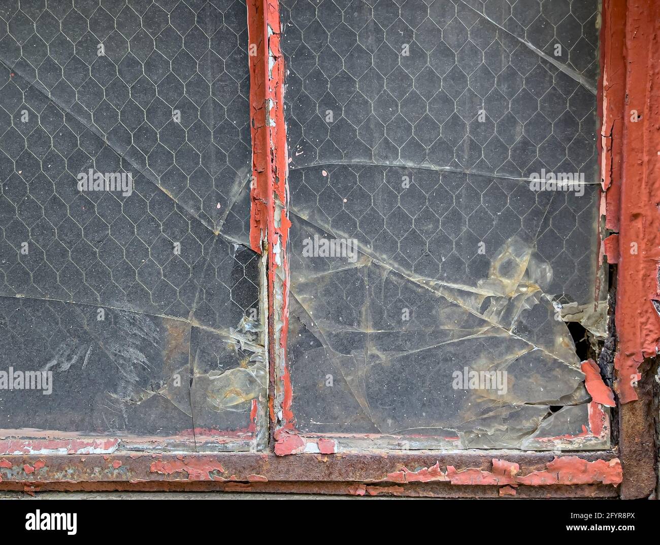 old broken window to basement with crack in corner Stock Photo - Alamy