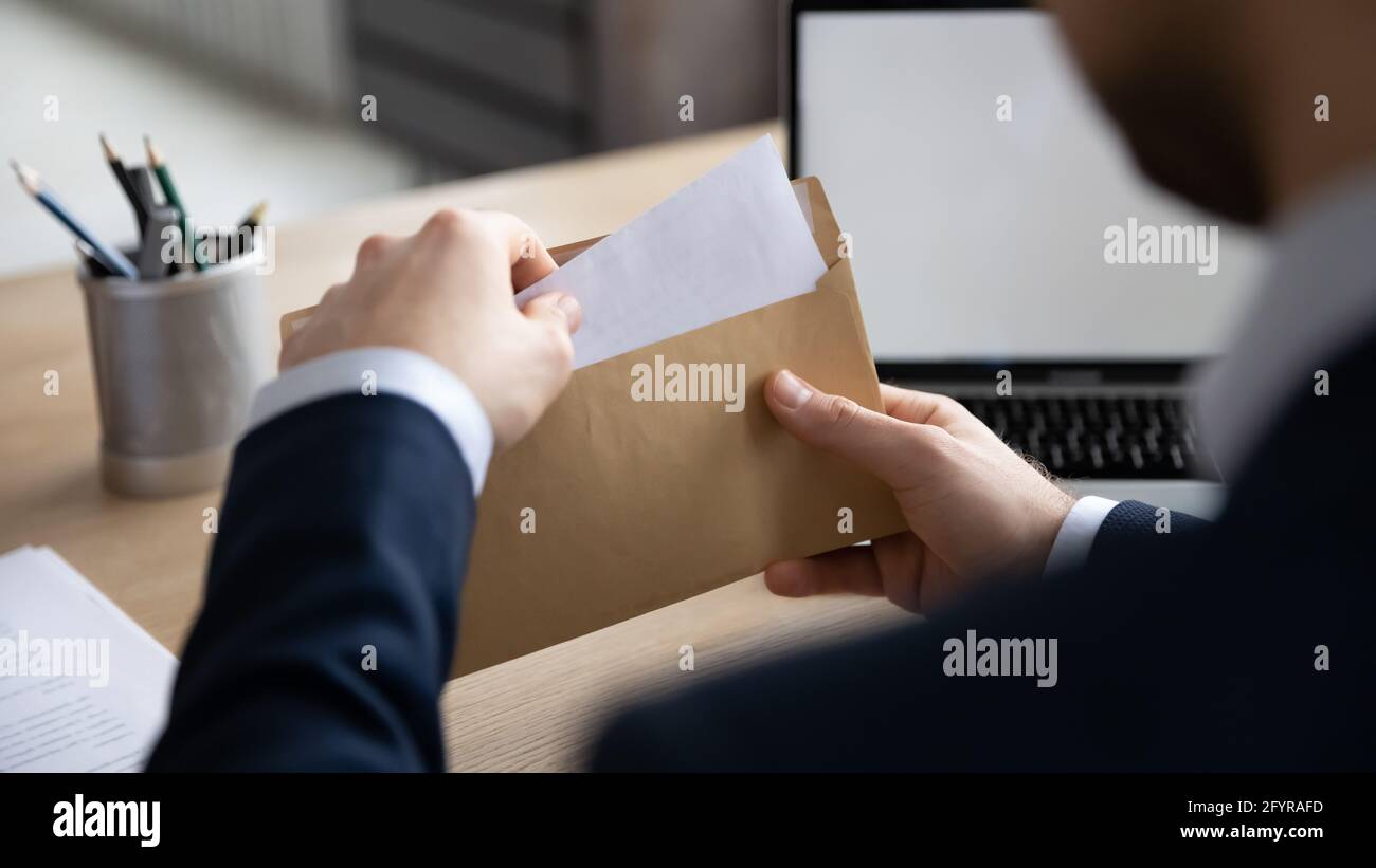 Business leader, executive, CEO receiving letter, invitation ...