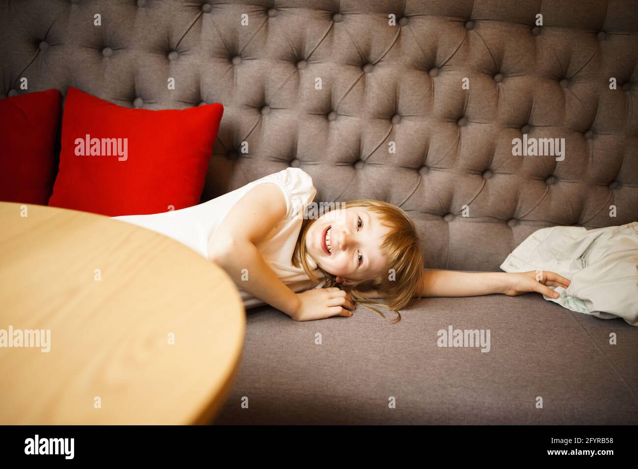 Pretty girl lying on hi-res stock photography and images - Alamy