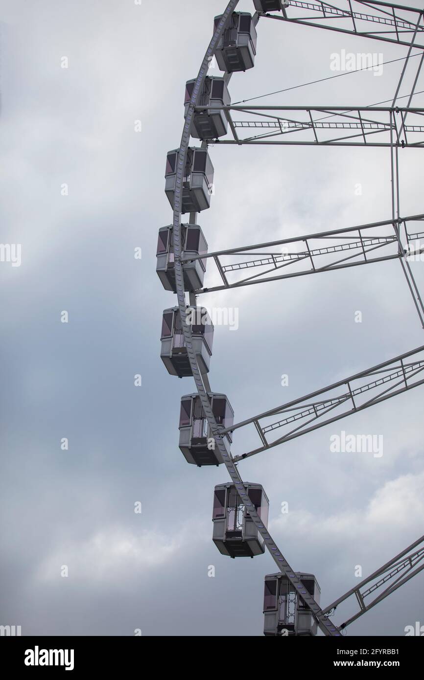Grey ferris wheel booths in Paris during a cloudy day Stock Photo - Alamy