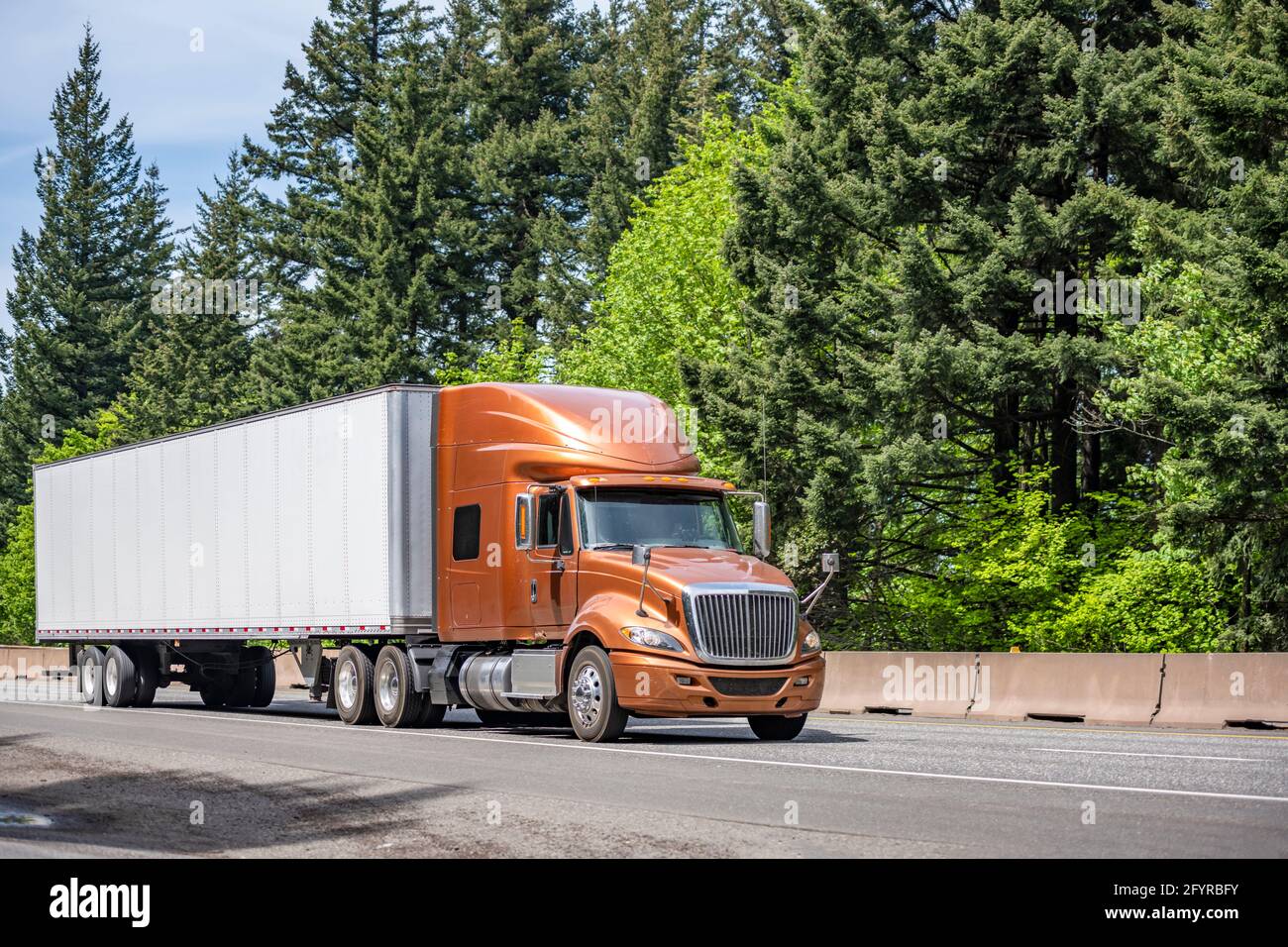 Brown big rig long haul industrial semi truck tractor transporting ...