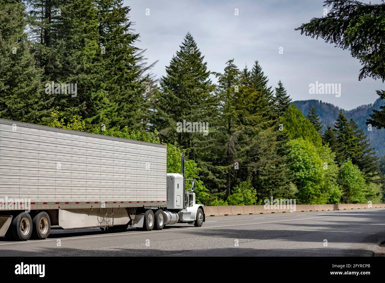 White classic big rig semi truck tractor with chrome accessories and ...
