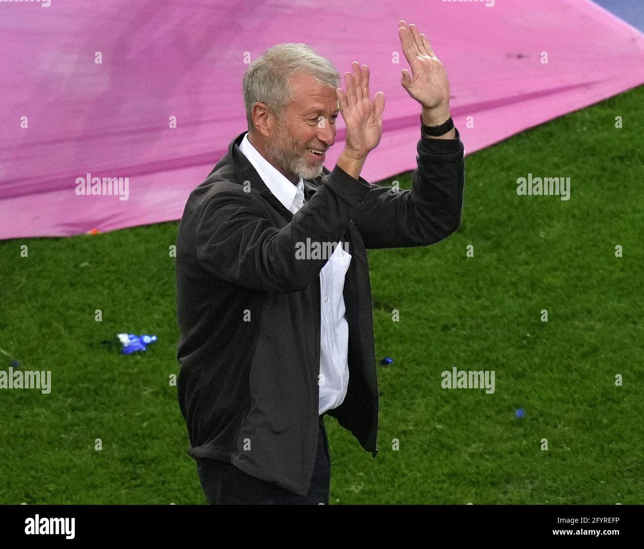 Chelsea owner Roman Abramovich celebrates on the pitch after the UEFA ...