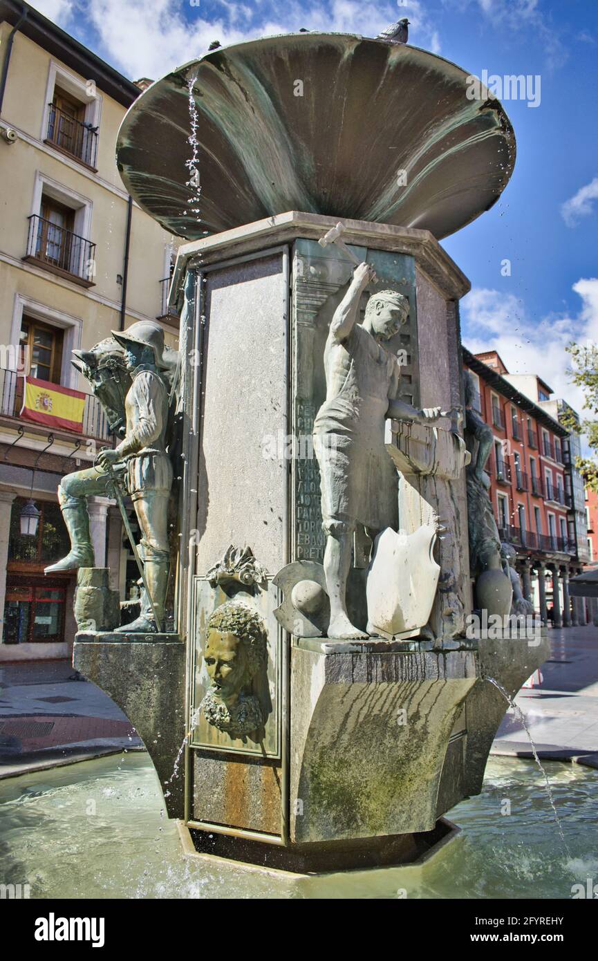 Statue of a blacksmith wielding a hammer on an anvil in the Golden ...