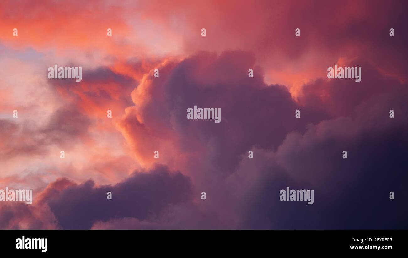 Cinematic pink purple fluffy clouds hi-res stock photography and images ...