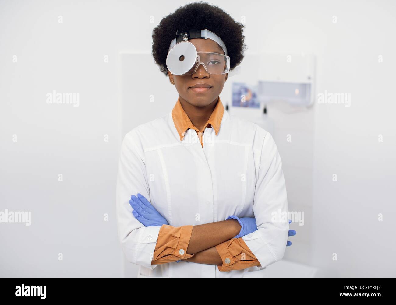 Portrait of young pleasant African American woman, confident ENT ...