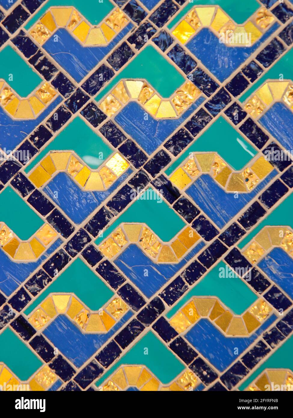 Detail of rich, gold, colorful mosaic tile work at the Sultan Qaboos ...