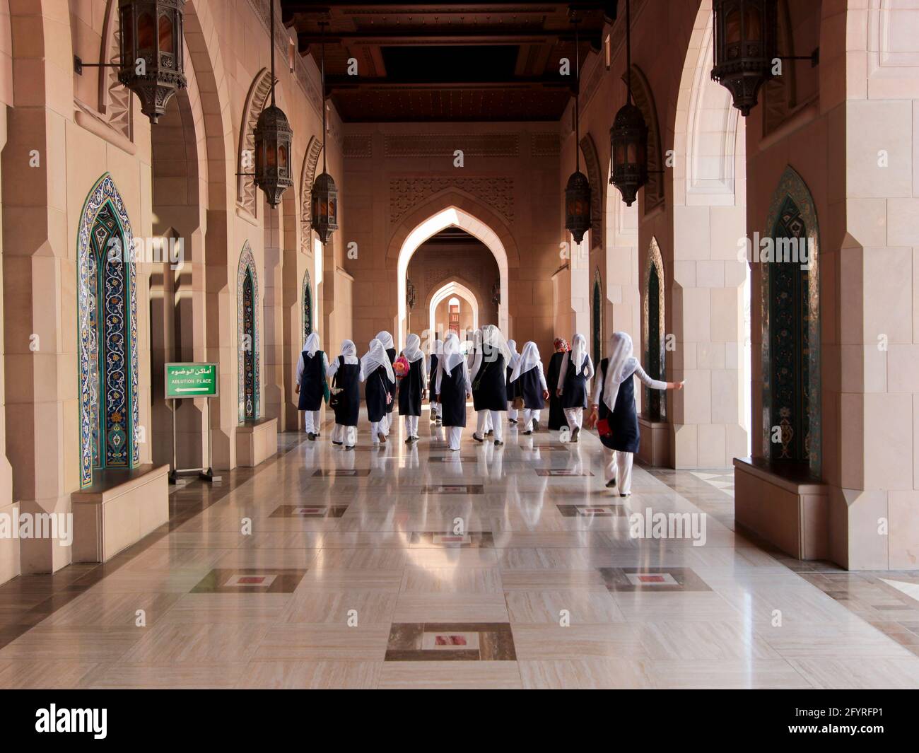 School girls tour the Sultan Qaboos Grand Mosque in Muscat, Oman Stock ...