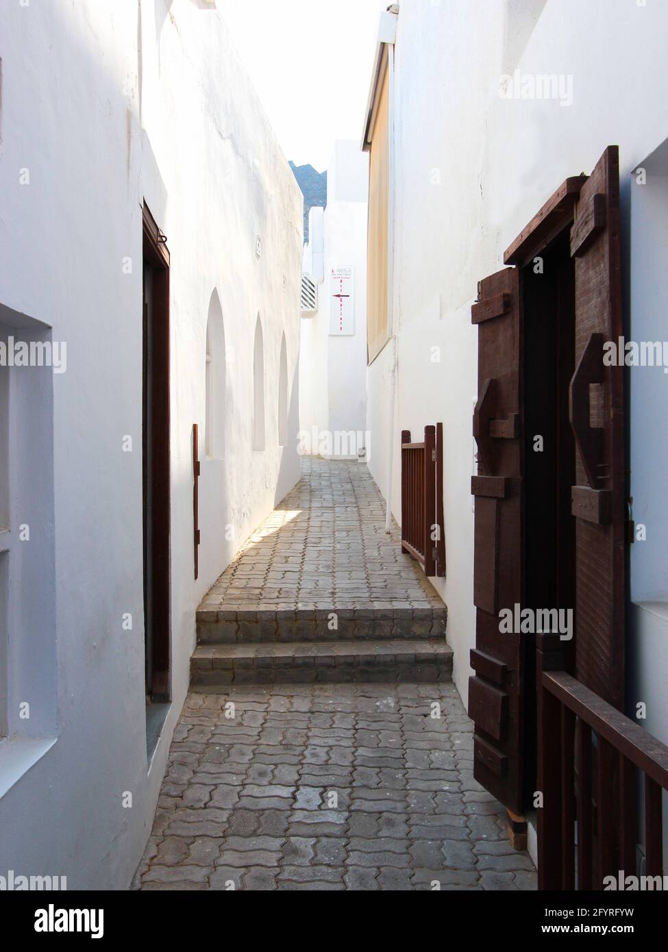 The exterior corridor leading to the heritage museum and old house ...