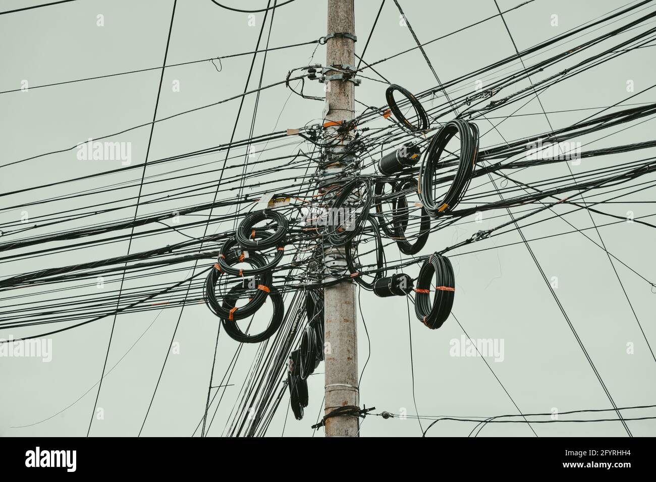 Electricity transmission tower and cables against the sky Stock Photo ...