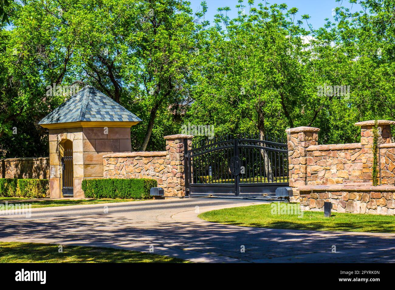 Metal Exit Gate With Walk Thru Gatehouse Stock Photo - Alamy