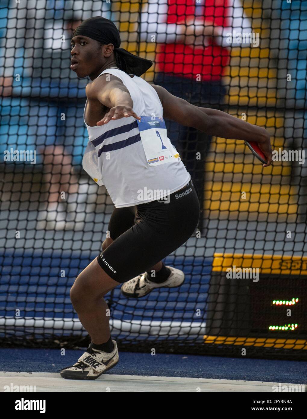 MANCHESTER - ENGLAND. 27 MAY: Reuben Vaughan competing in the discus ...