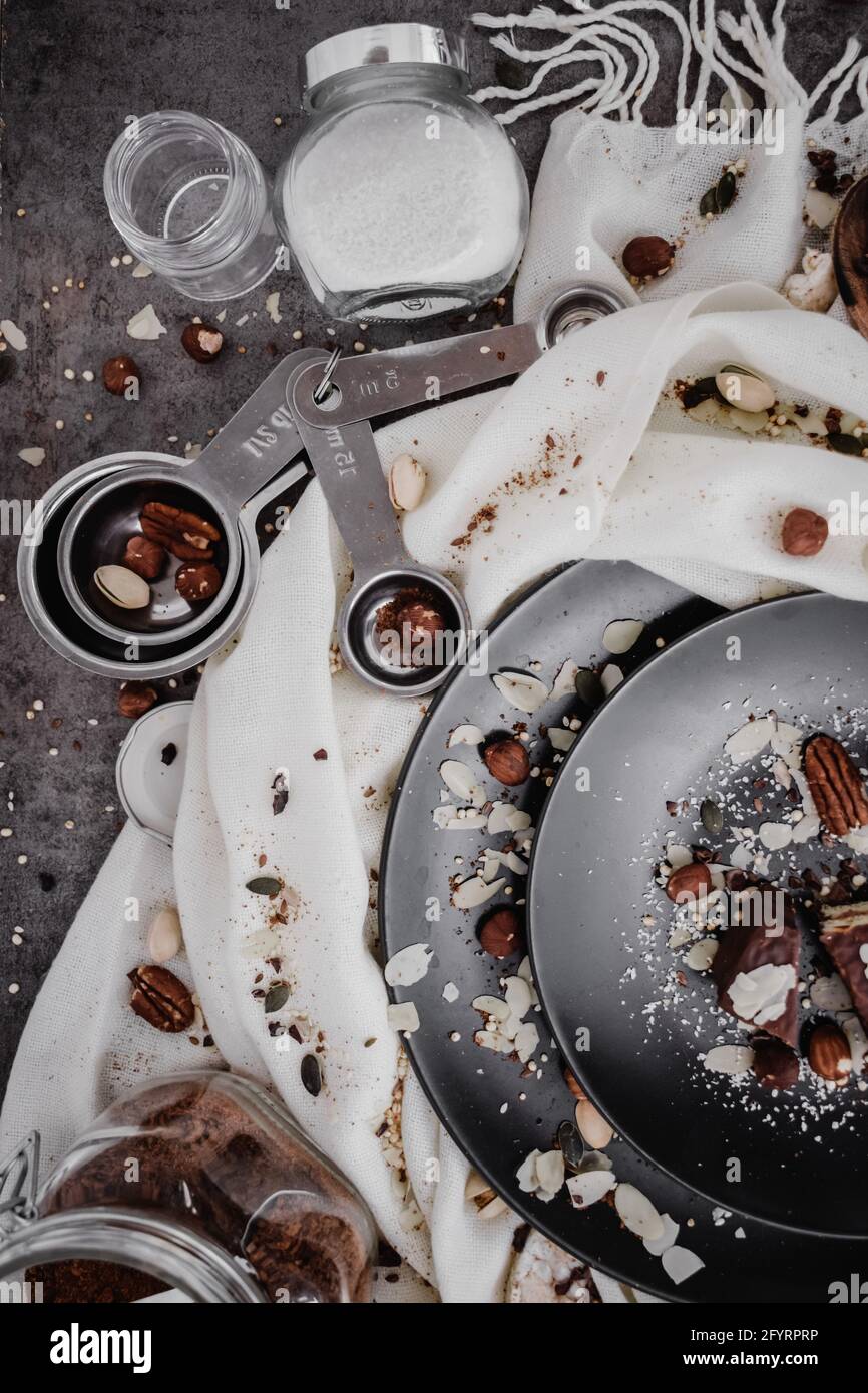 Vertical top view of a messy kitchen table with herbs and spices Stock ...