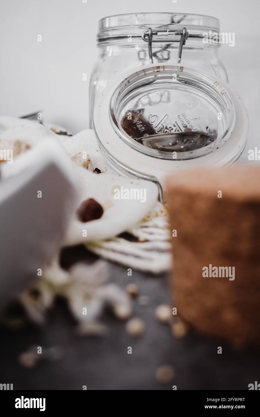 Vertical shot of various spices, seasonings and ingredients on a ...