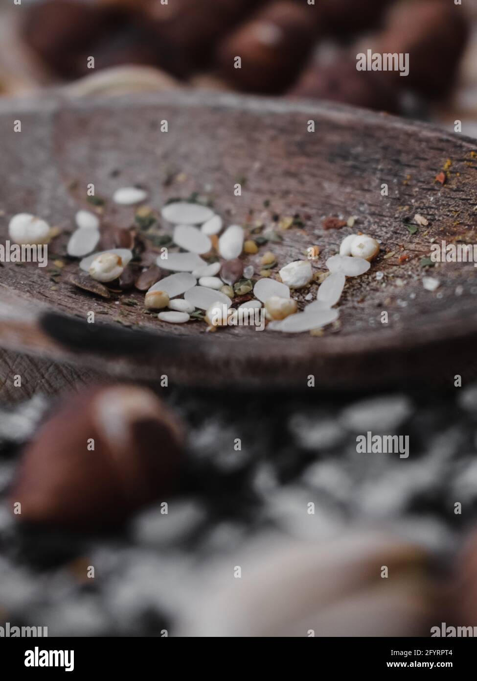 Vertical closeup shot of spices on a messy kitchen table Stock Photo ...