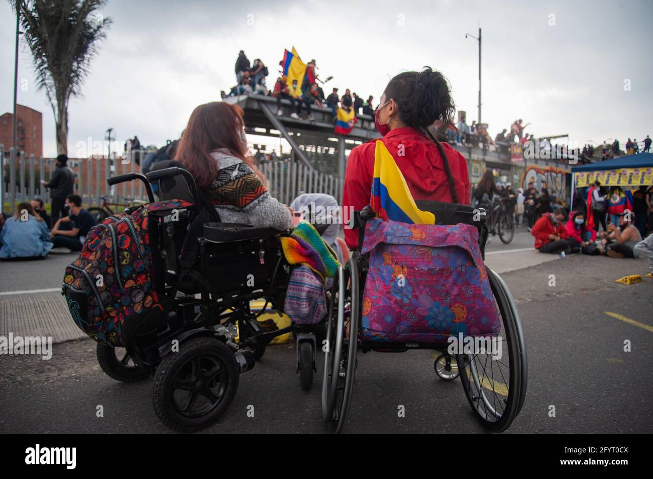 Women in wheelchairs particpate in the protests as thousands protested ...