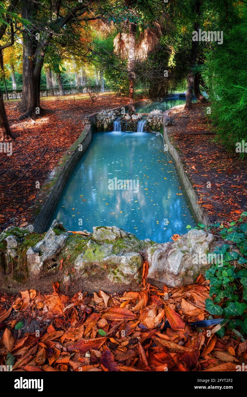 A decorative pool in a park on a warm autumn day Stock Photo - Alamy