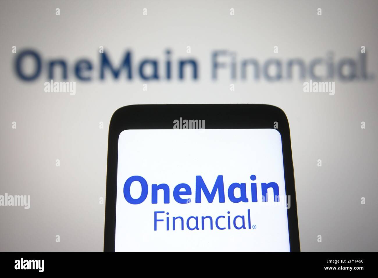 In this photo illustration, OneMain Financial (OneMain Holdings) logo ...