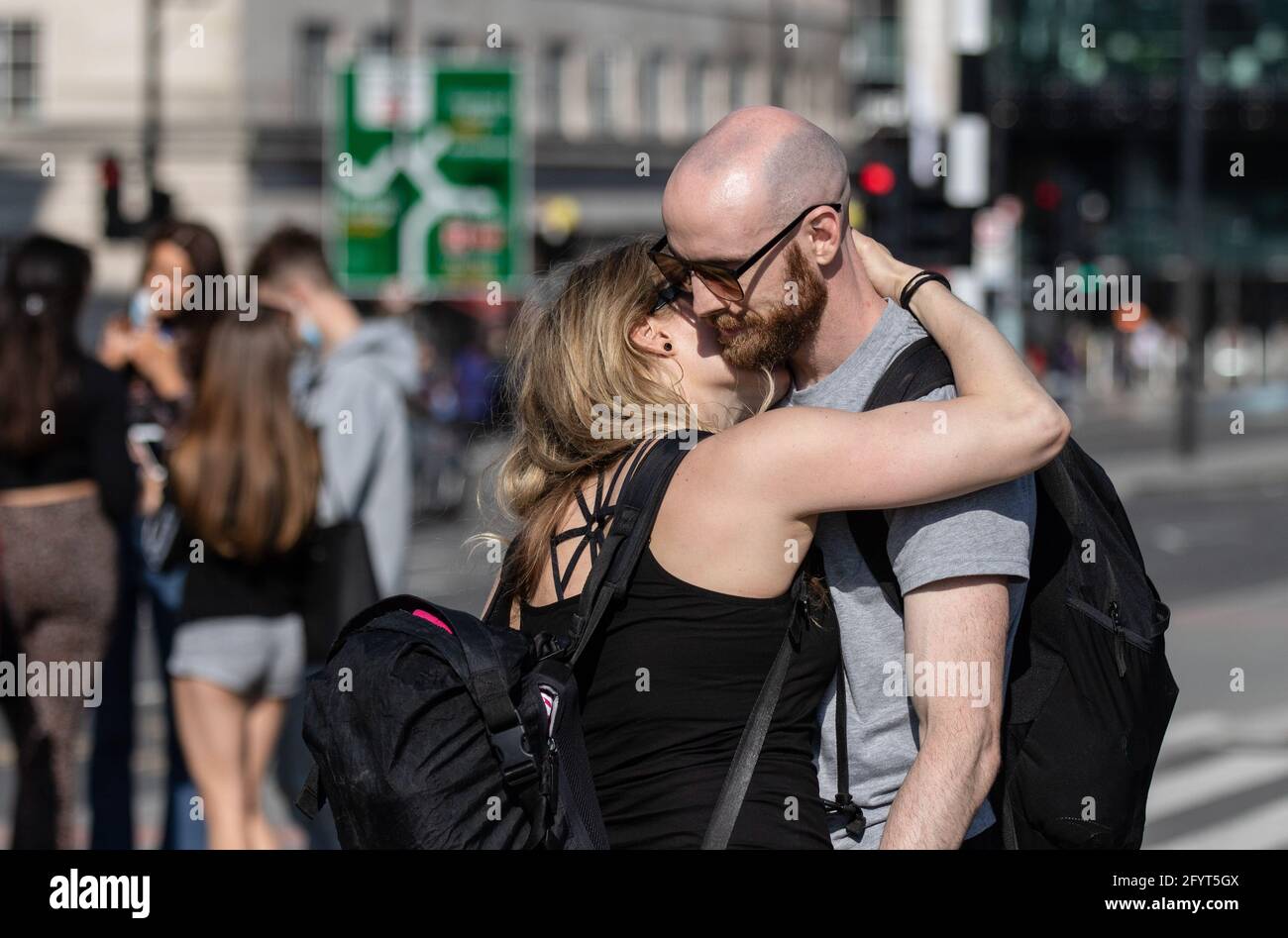 A couple seen hugging each other in London. (Photo by May James / SOPA ...