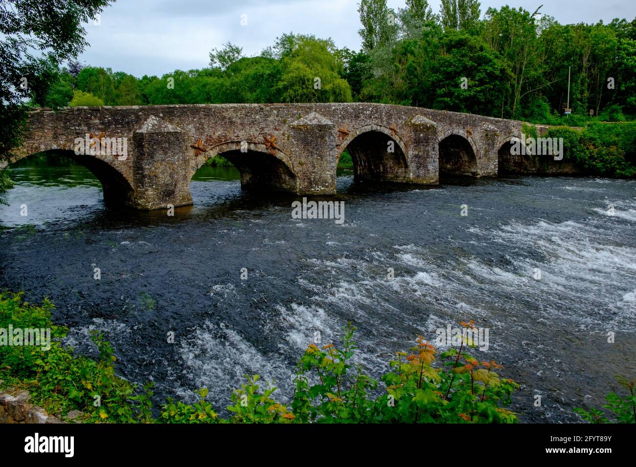 Historic Bickleigh Bridge on the River Exe, Devon, UK. This is the ...