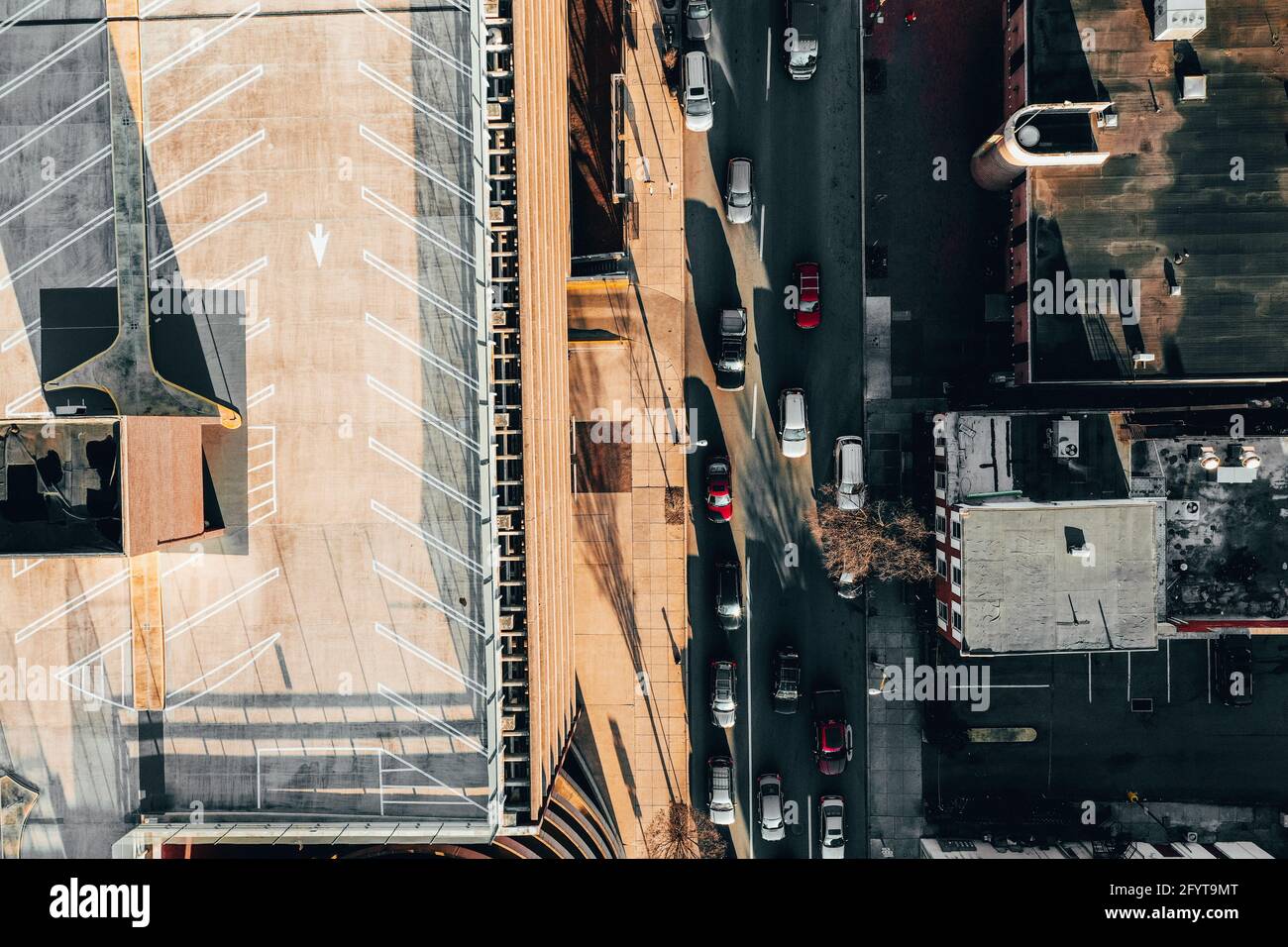 An aerial top view of cars on a road near buildings Stock Photo - Alamy