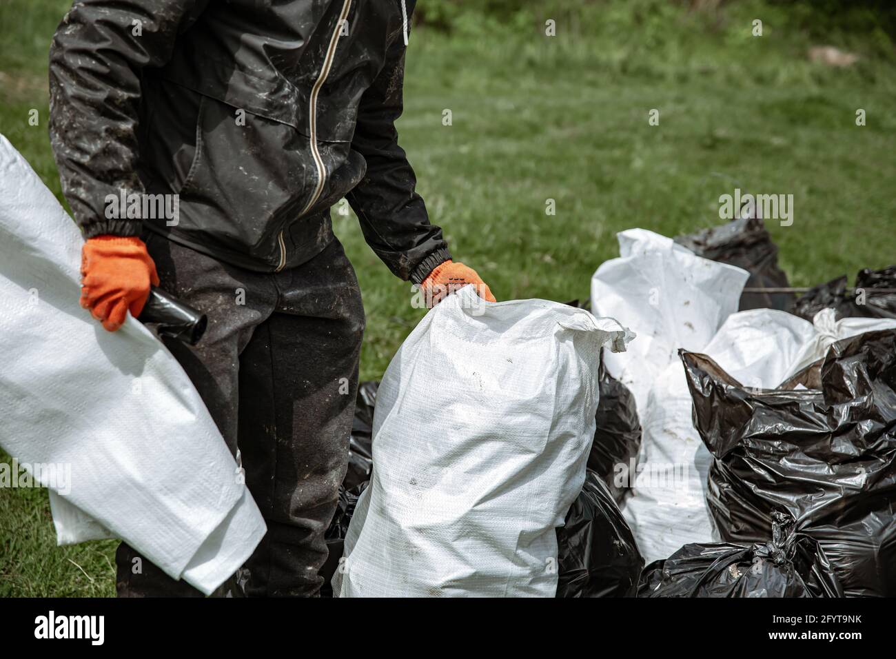 Close up of trash bags filled with trash after cleaning the environment ...