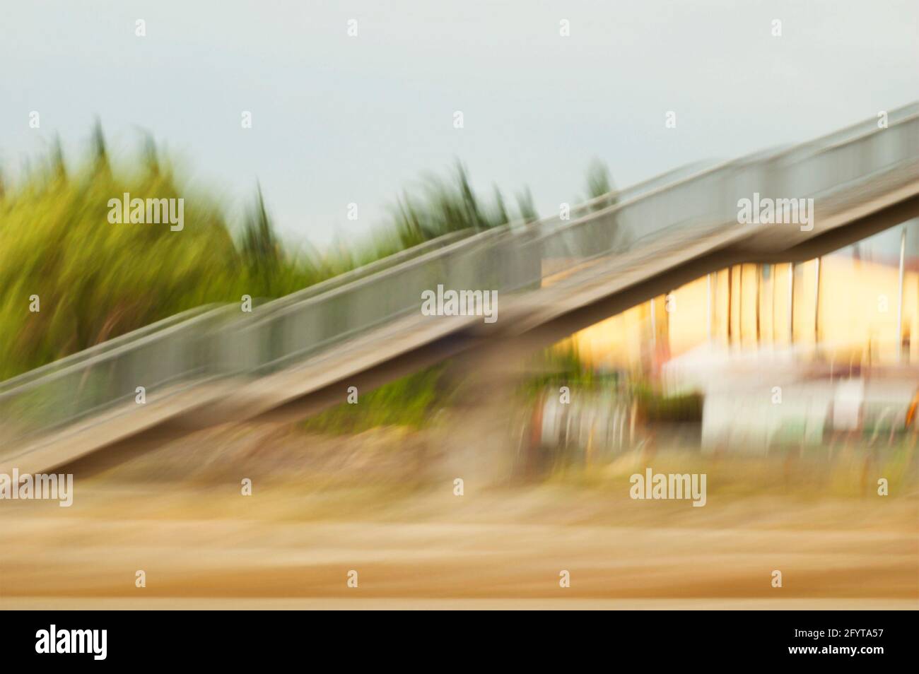 Motion blur image of a bridge staircase. Staircase blurred duew to ...