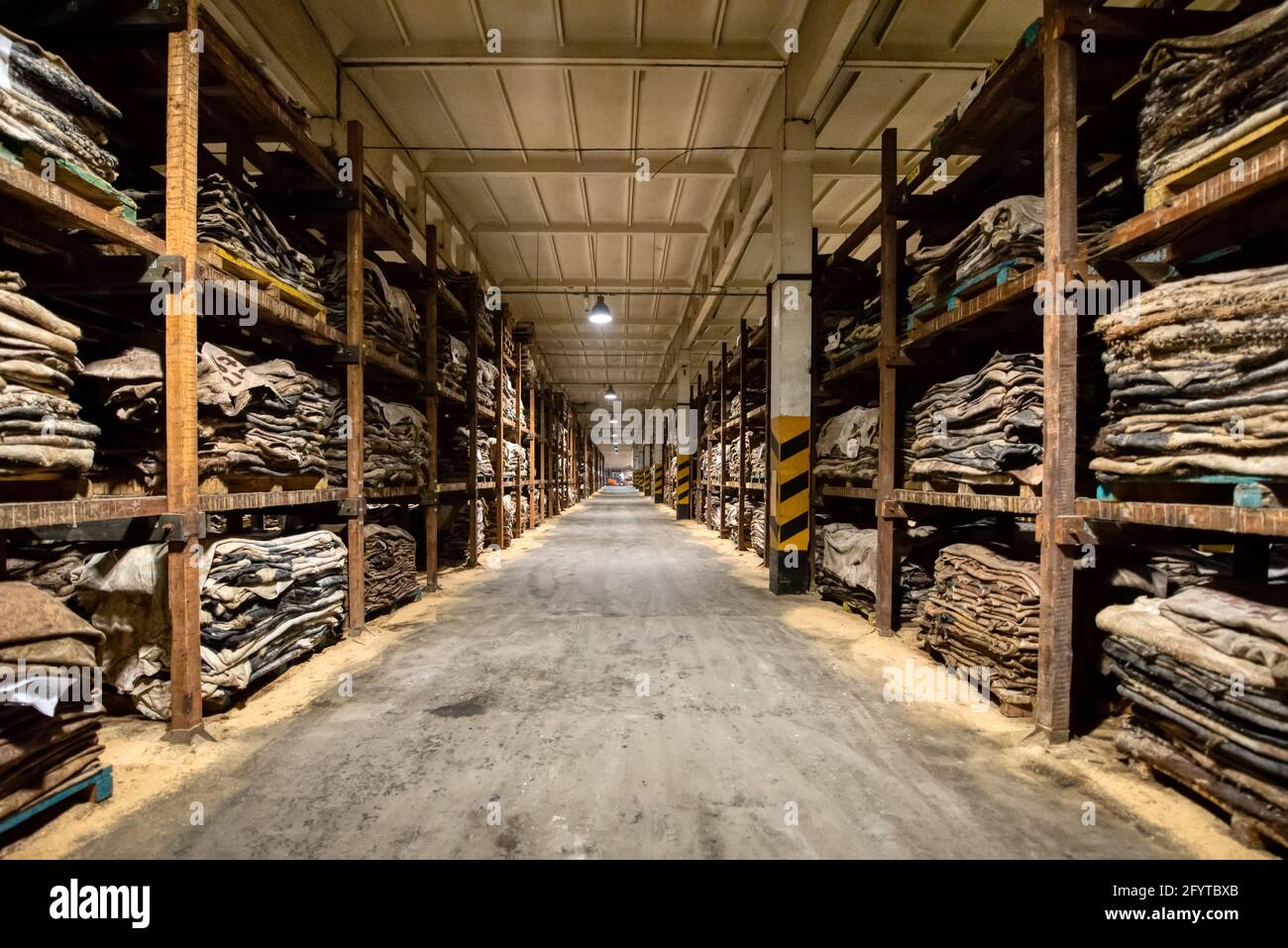 Raw salted cow skins are piled up Stock Photo - Alamy