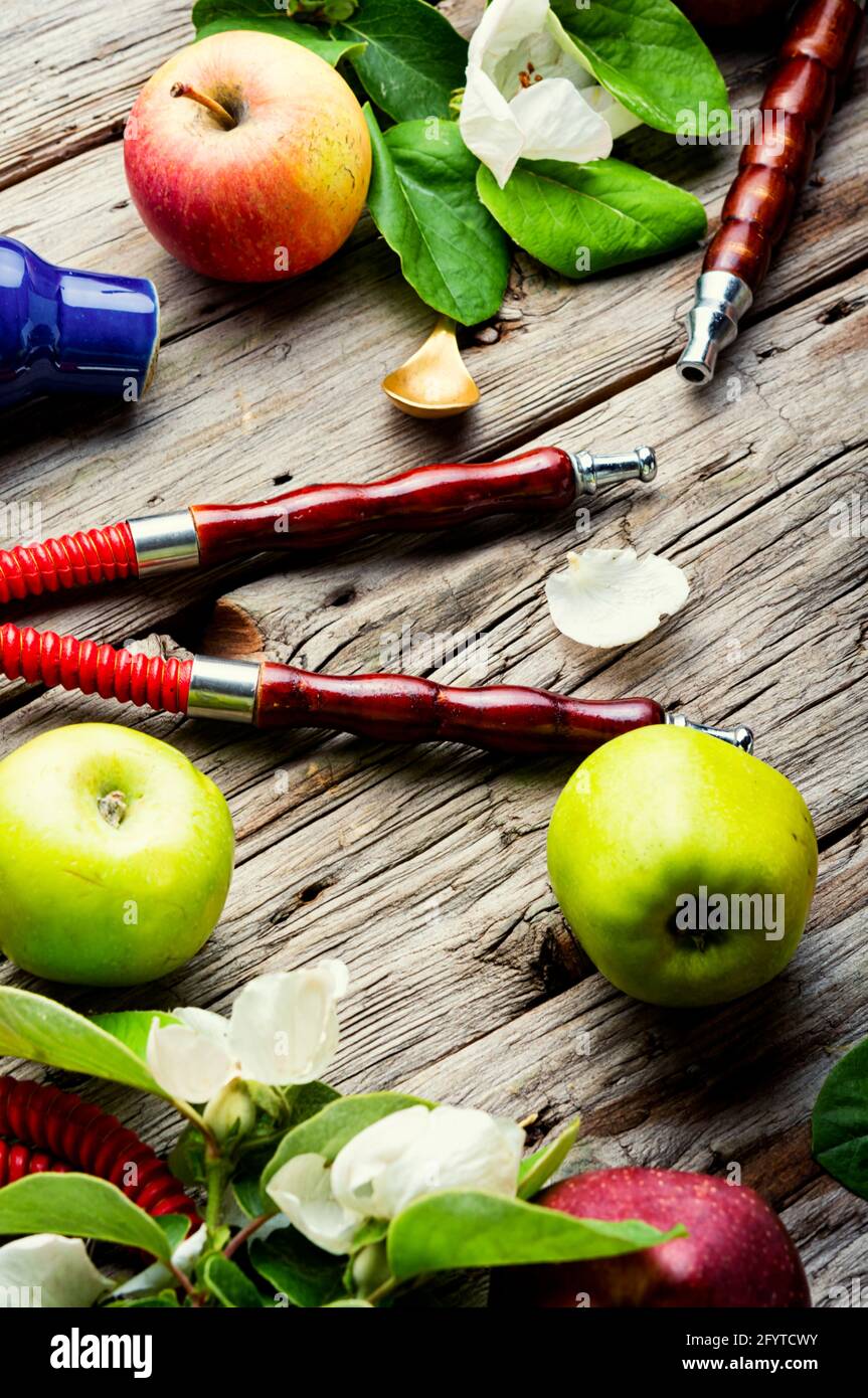Oriental hookah with the aroma of fresh apples. Floral shisha tobacco ...