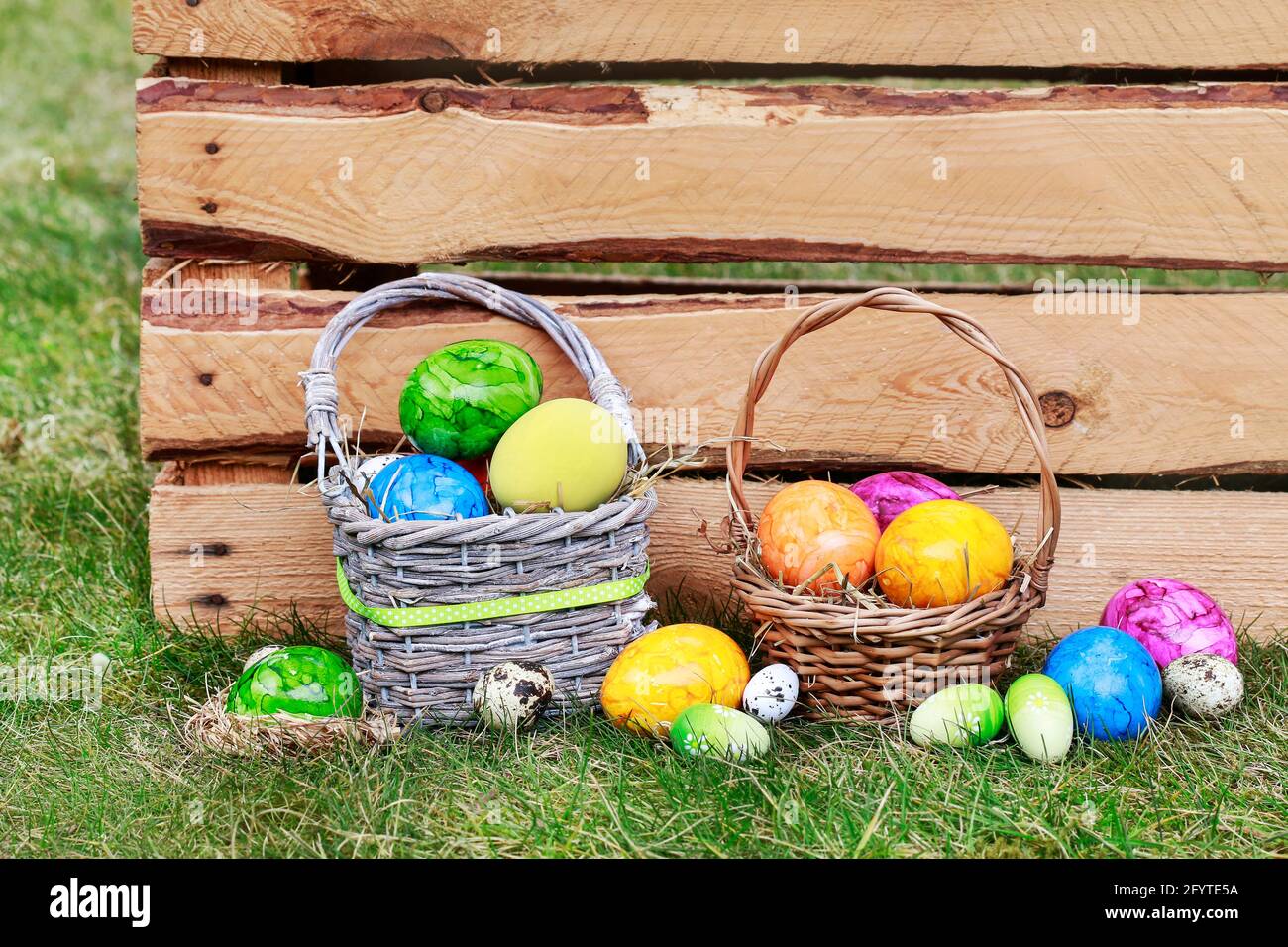 Traditional Easter basket with colorful eggs. Festive decor Stock Photo ...