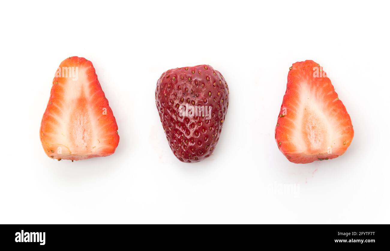 strawberry slice on white background Stock Photo - Alamy